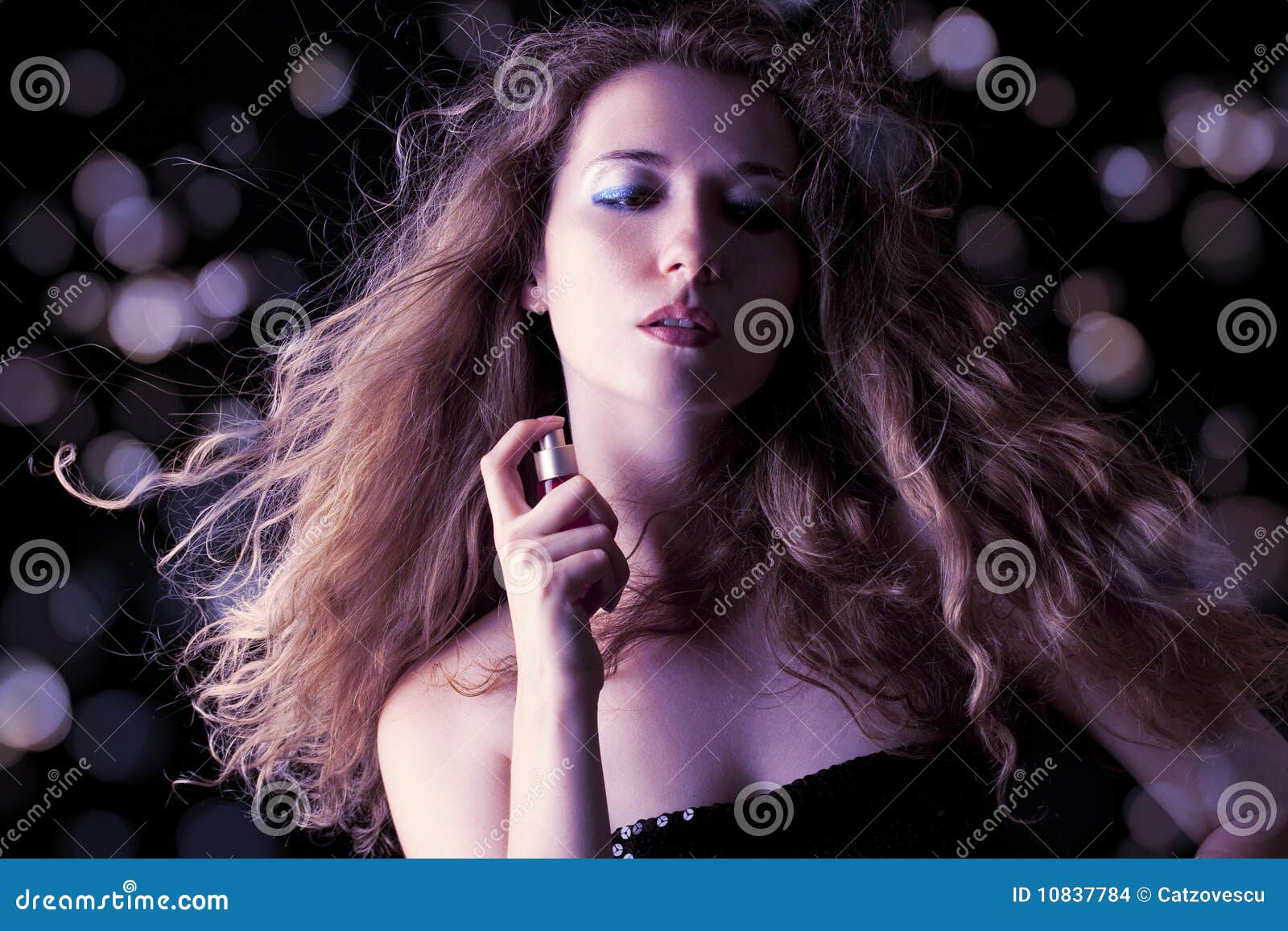 Sensual perfume stock photo. Image of long, holding, lights - 10837784