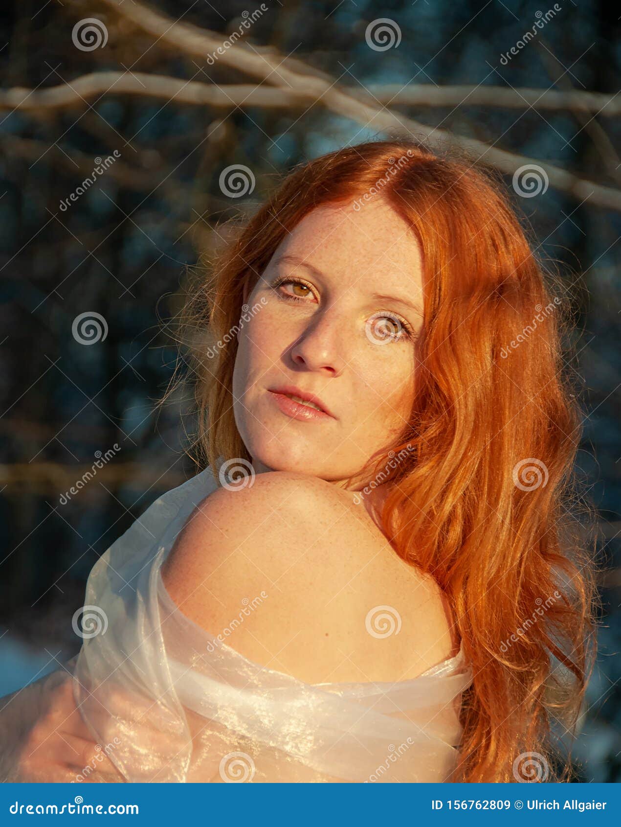 Sensual Portrait Of Red Haired Woman Under The Trees Stock Image