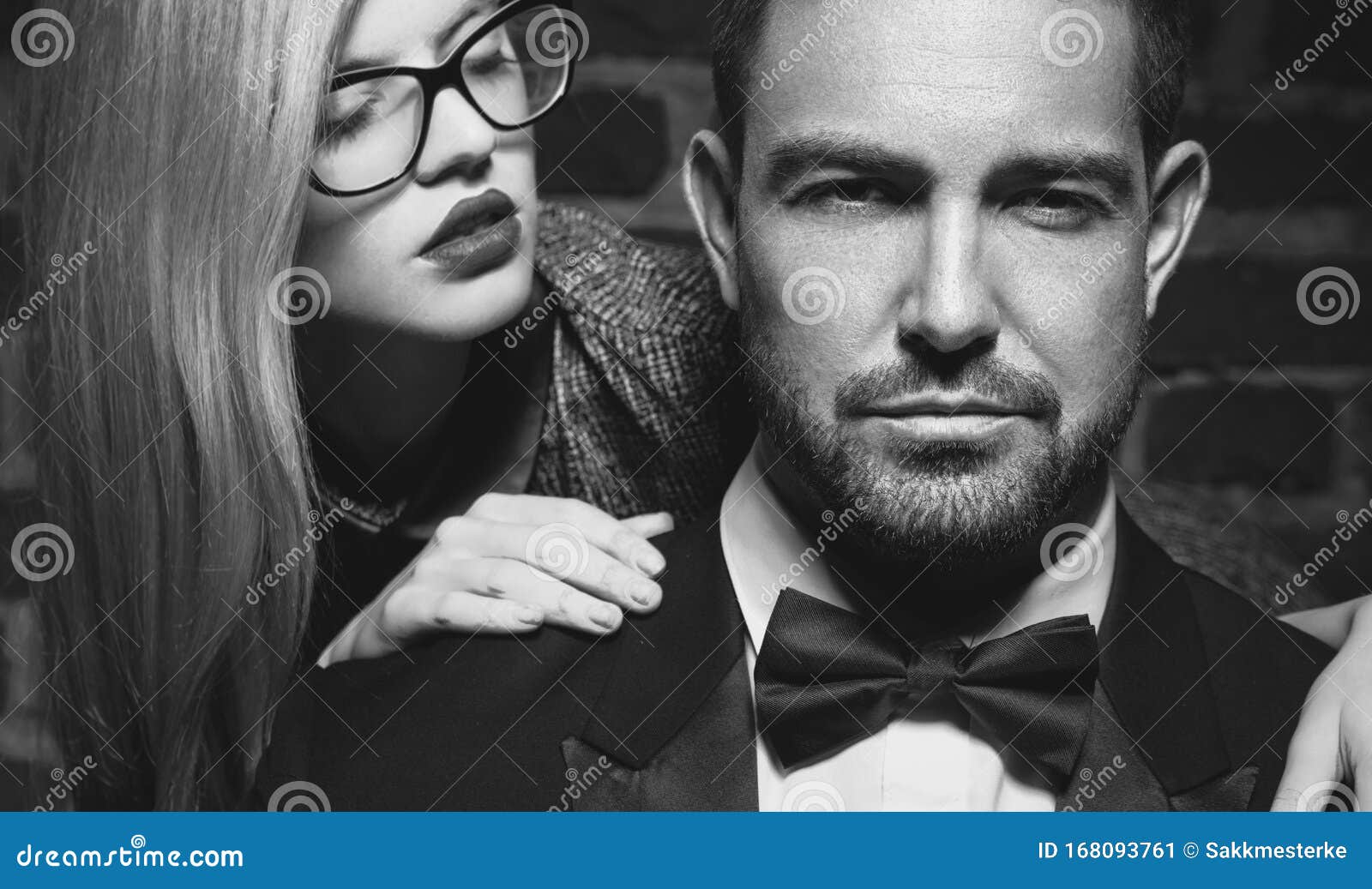 Sensual Young Woman Seducing Macho Man In Tuxedo Stock Image Image Of