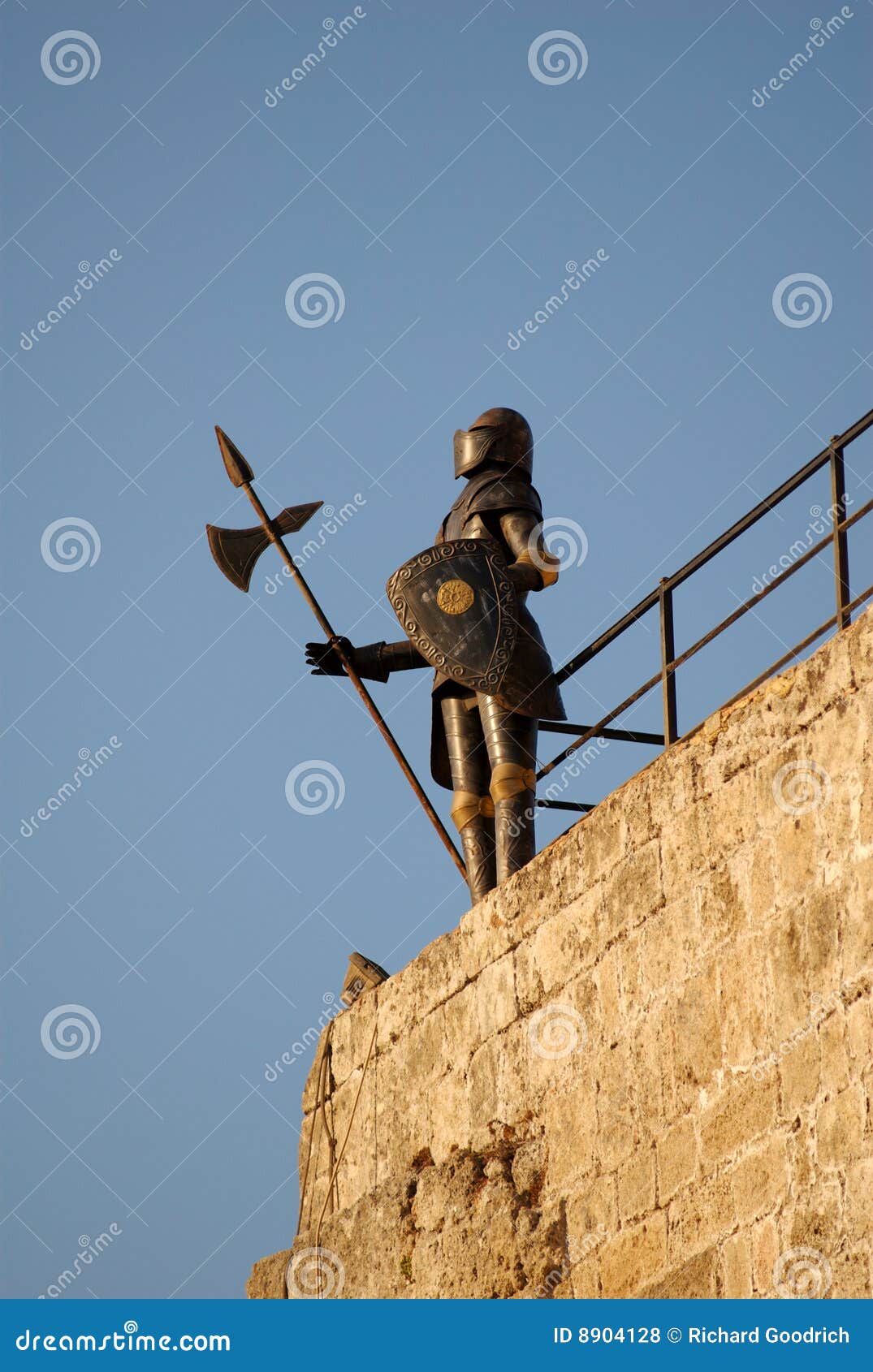 The Sentinel, Rhodes stock photo. Image of suit, clock - 8904128
