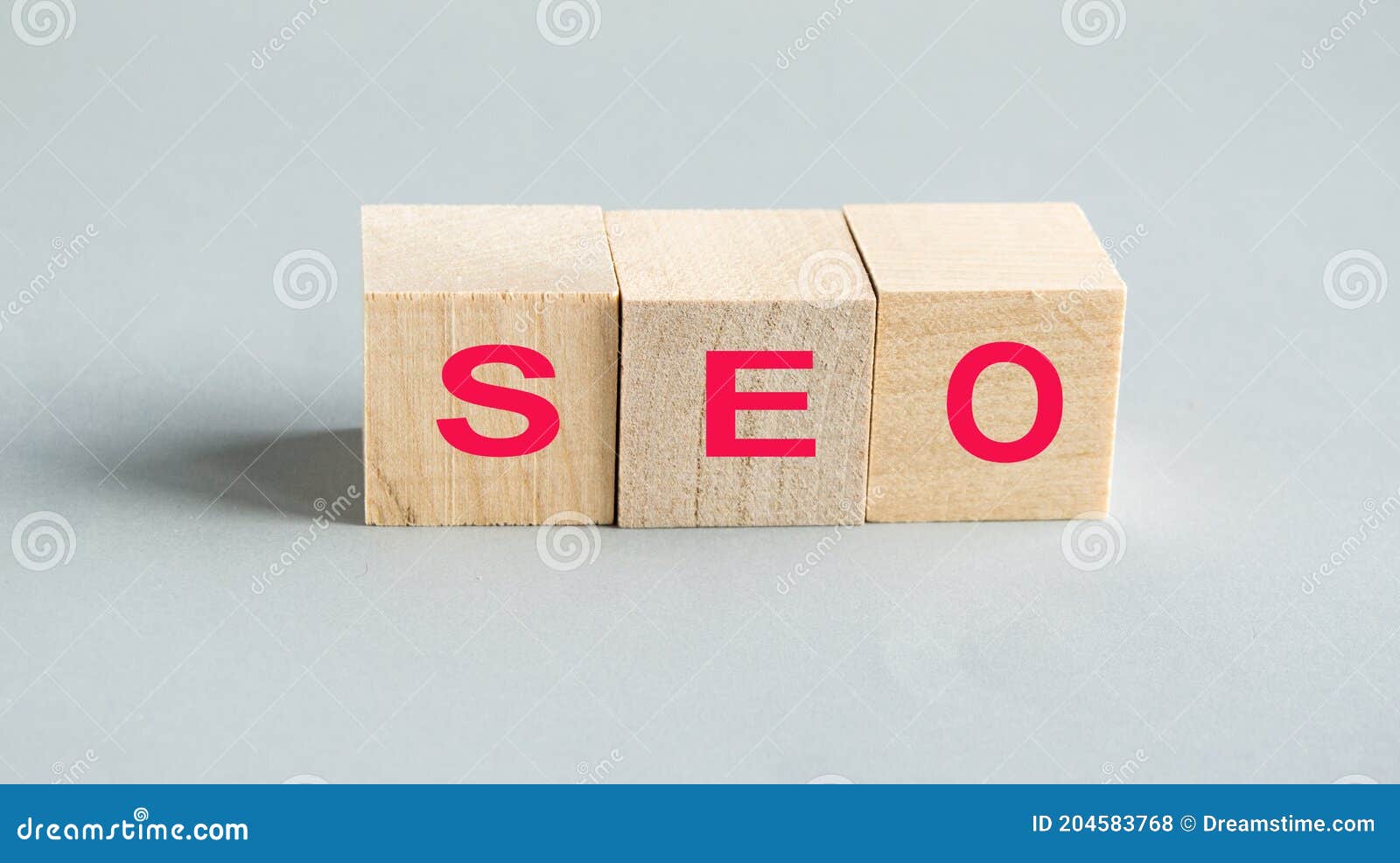 SEO Search Engine Optimization Text on Wooden Cubes on a Gray Table the Concept of Minimalism ...