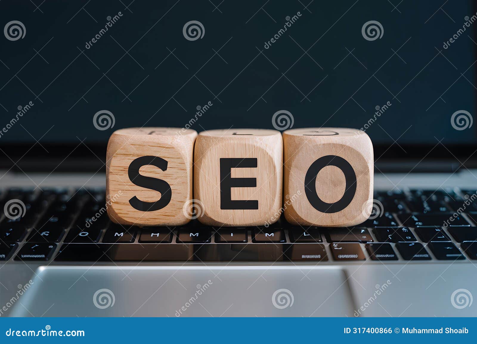 SEO Wooden Blocks on Laptop Keyboard, Representing Search Engine ...