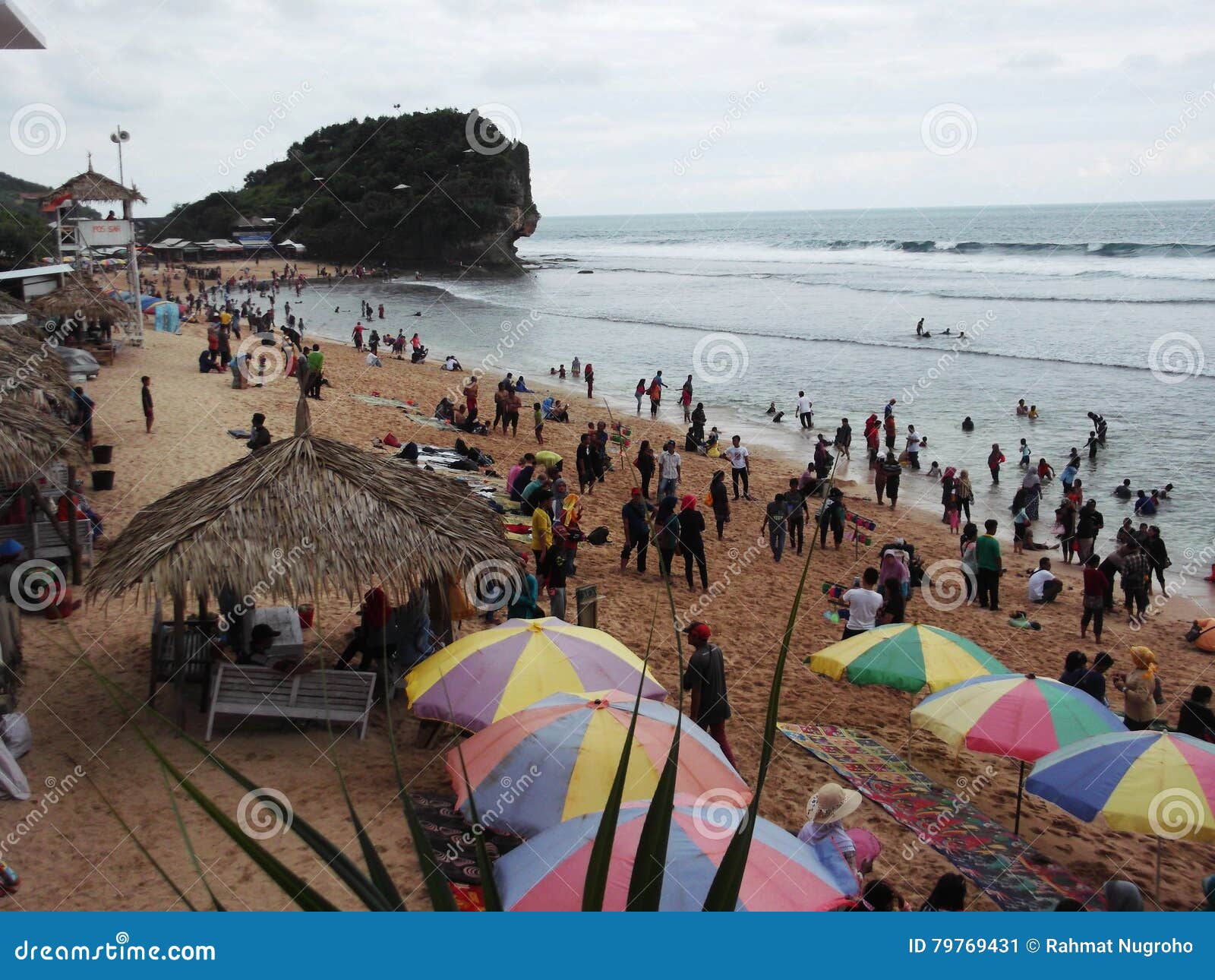 Sepanjang beach editorial photo. Image of sunset, gunung - 79769431