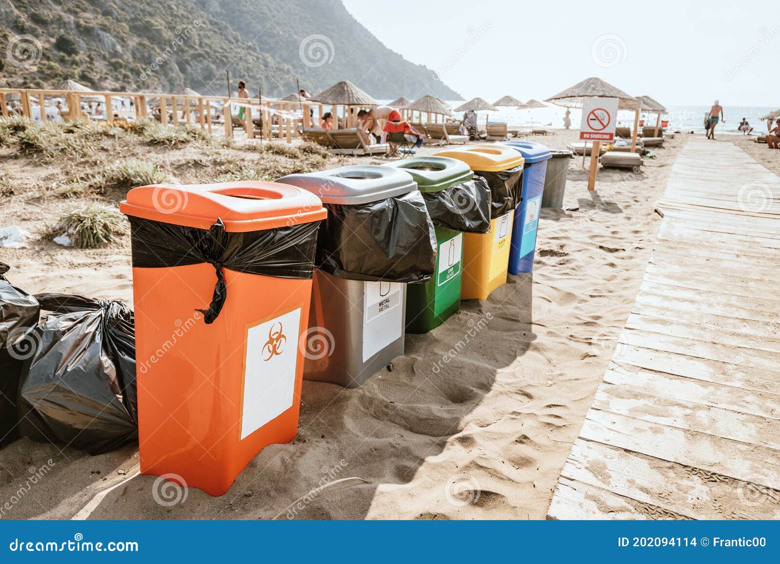 Separate Collection of Garbage on a Public Beach As an Example of a ...