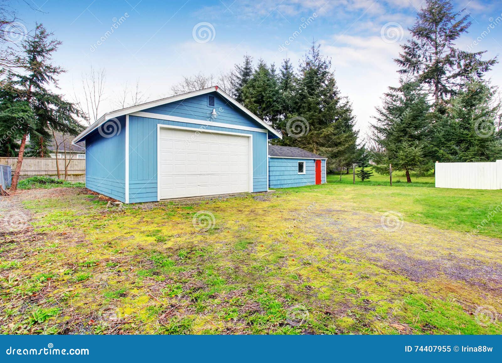 Separate Garage with Blue Trim and White Door Stock Image - Image of ...