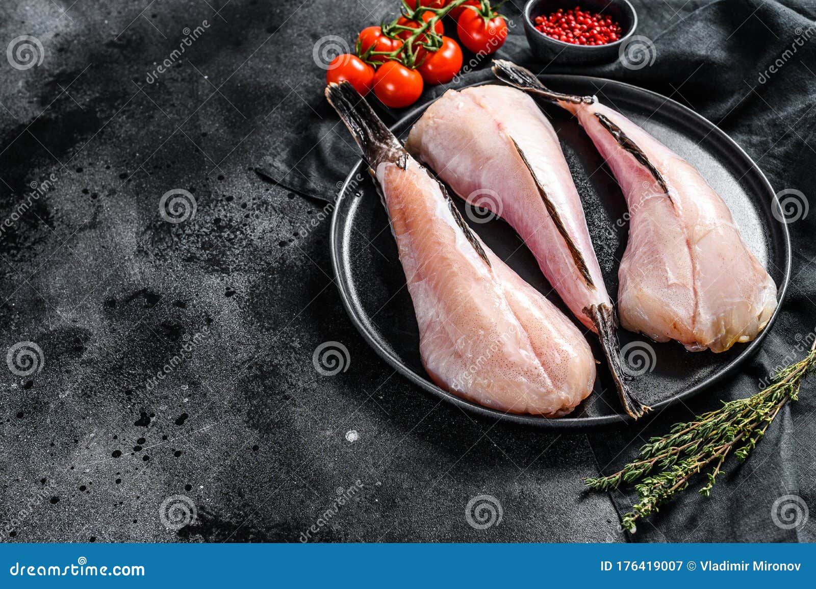 Separate Raw Fish Monkfish. Black Background. Top View Stock Image ...