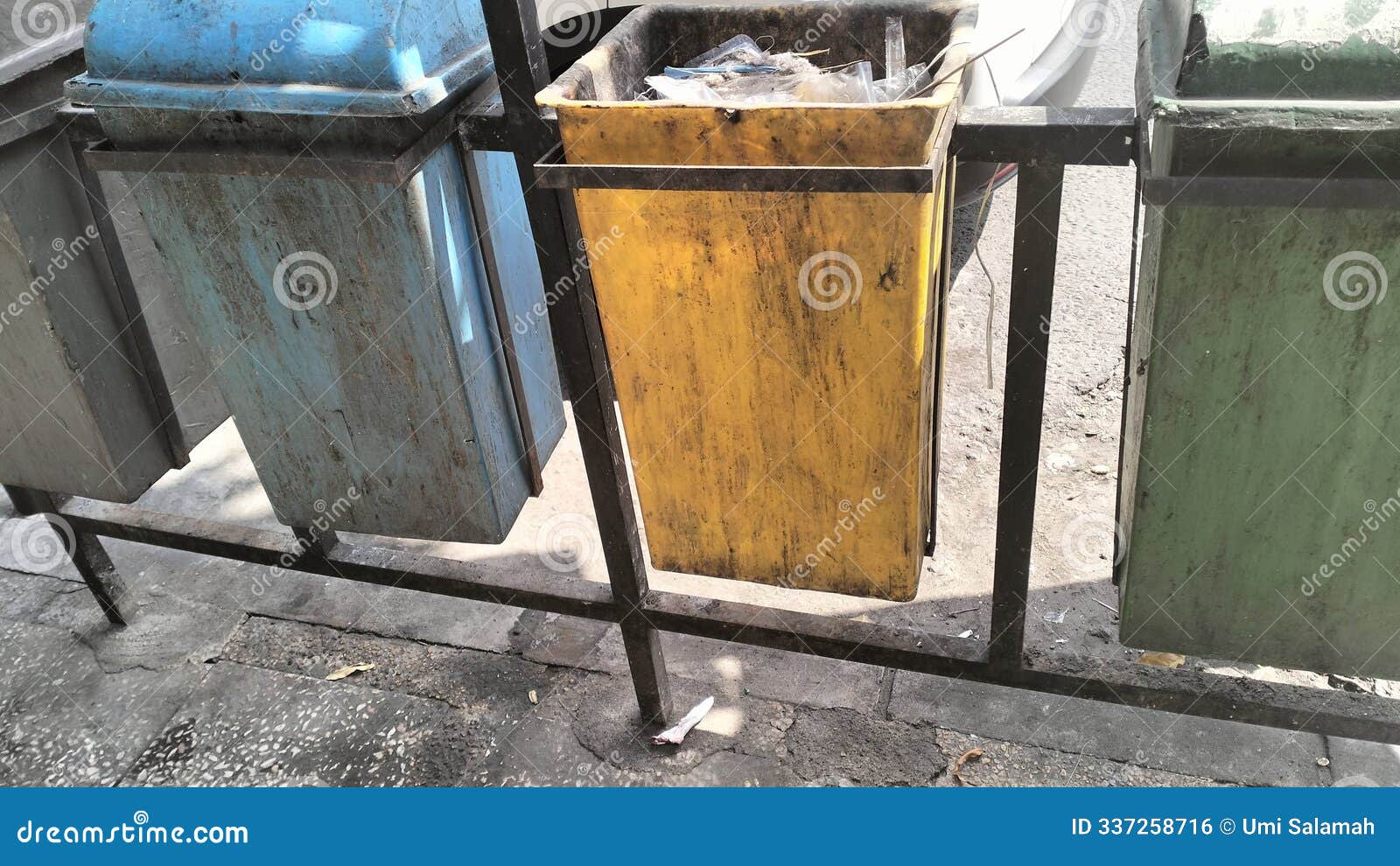 Trash Bins In Grassy Park Area For Clean And Neat Concept With No ...