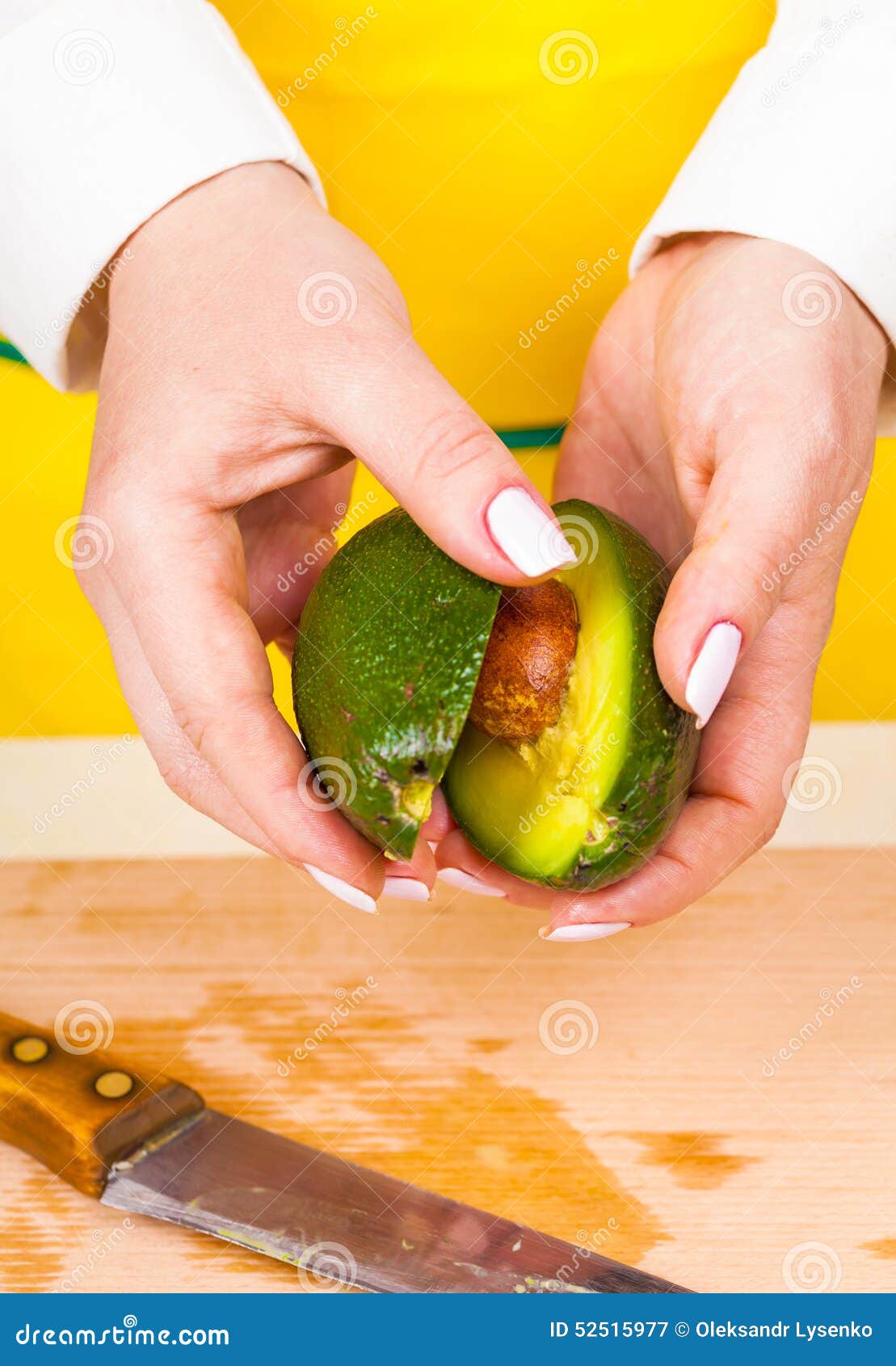 Separates Avocado into Two Parts Stock Image - Image of fresh, person ...