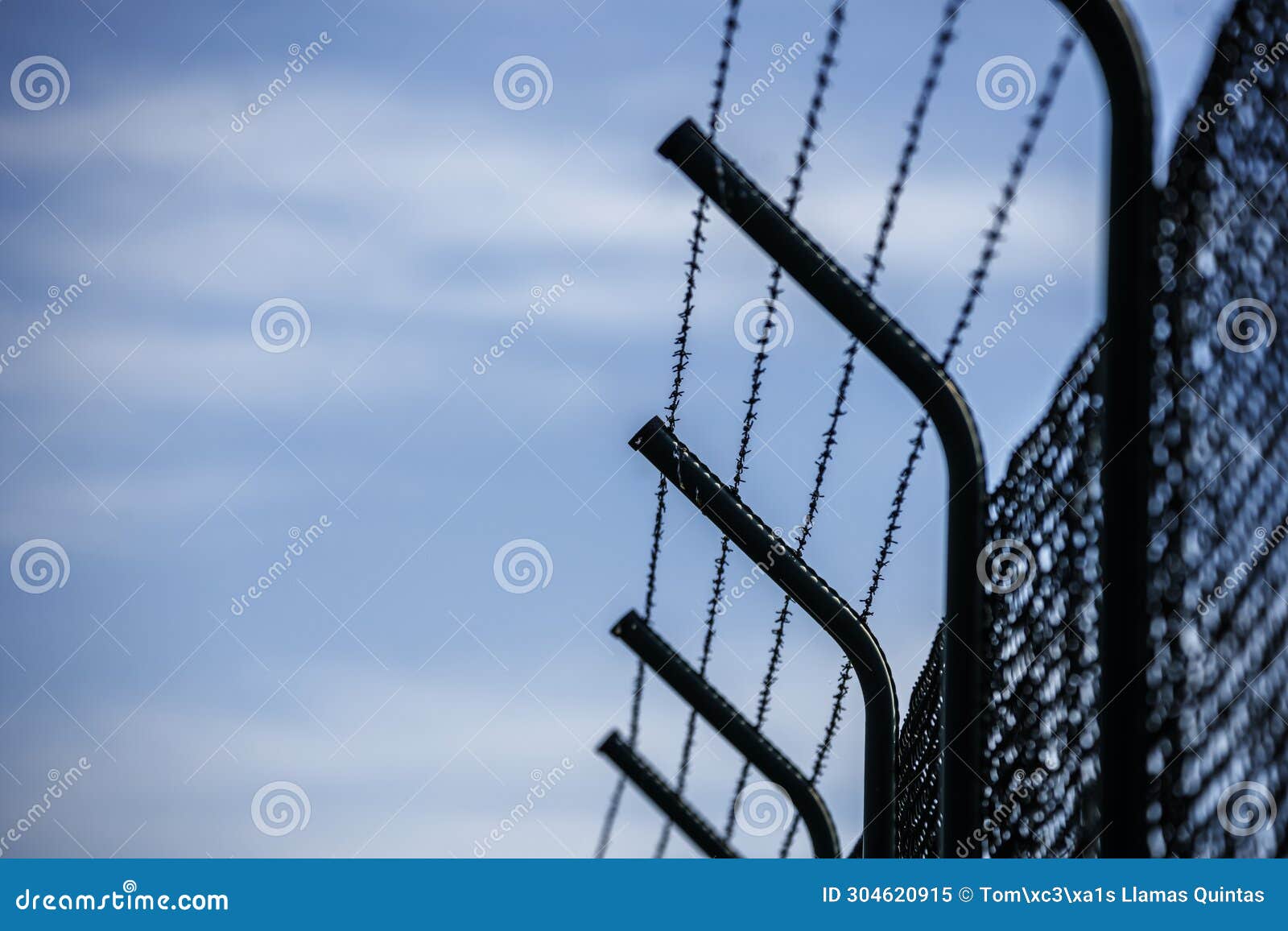 A Separator Fence in a Field with Anti-trespass Spikes Stock Image ...