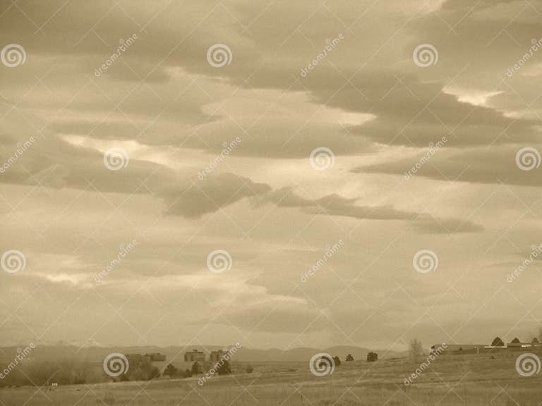 Sepia clouds over field stock photo. Image of space, open - 975862