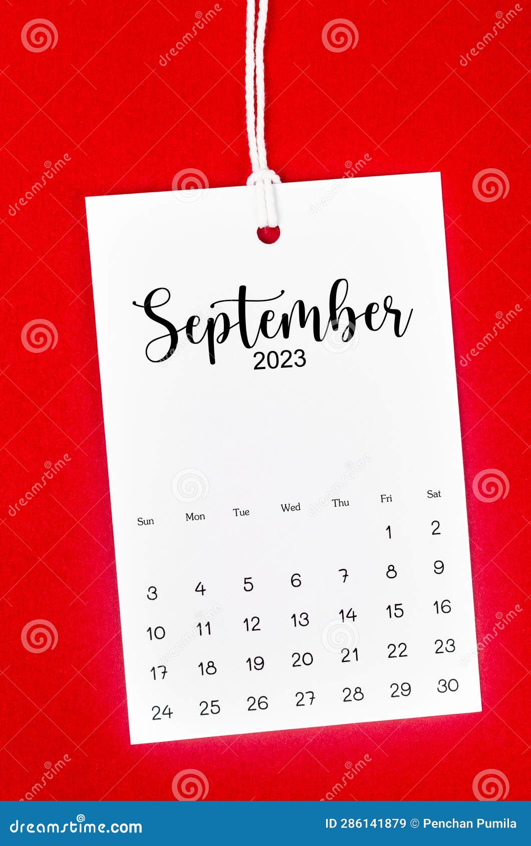 The September 2023 Calendar Page for 2023 Year Hanged on White Rope on ...