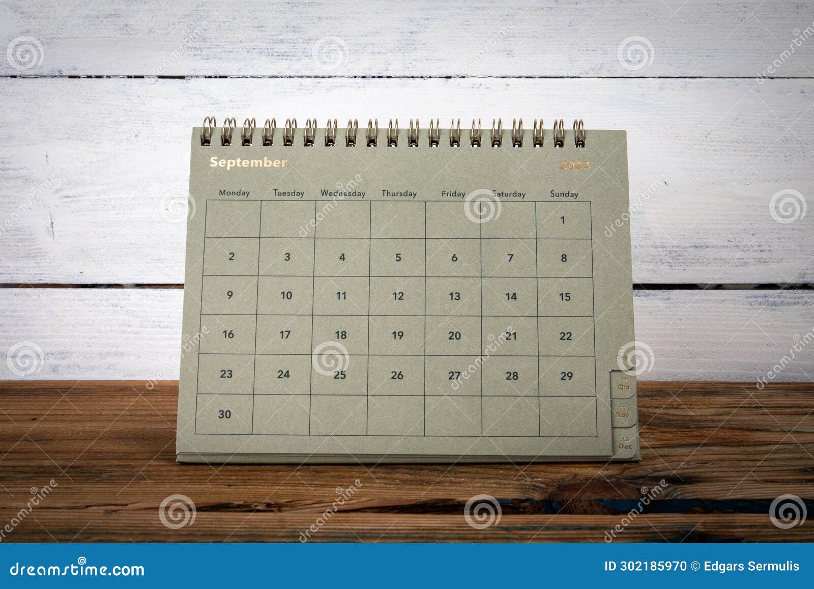SEPTEMBER 2024 Cardboard Desk Calendar and Planner on a Wooden Texture ...