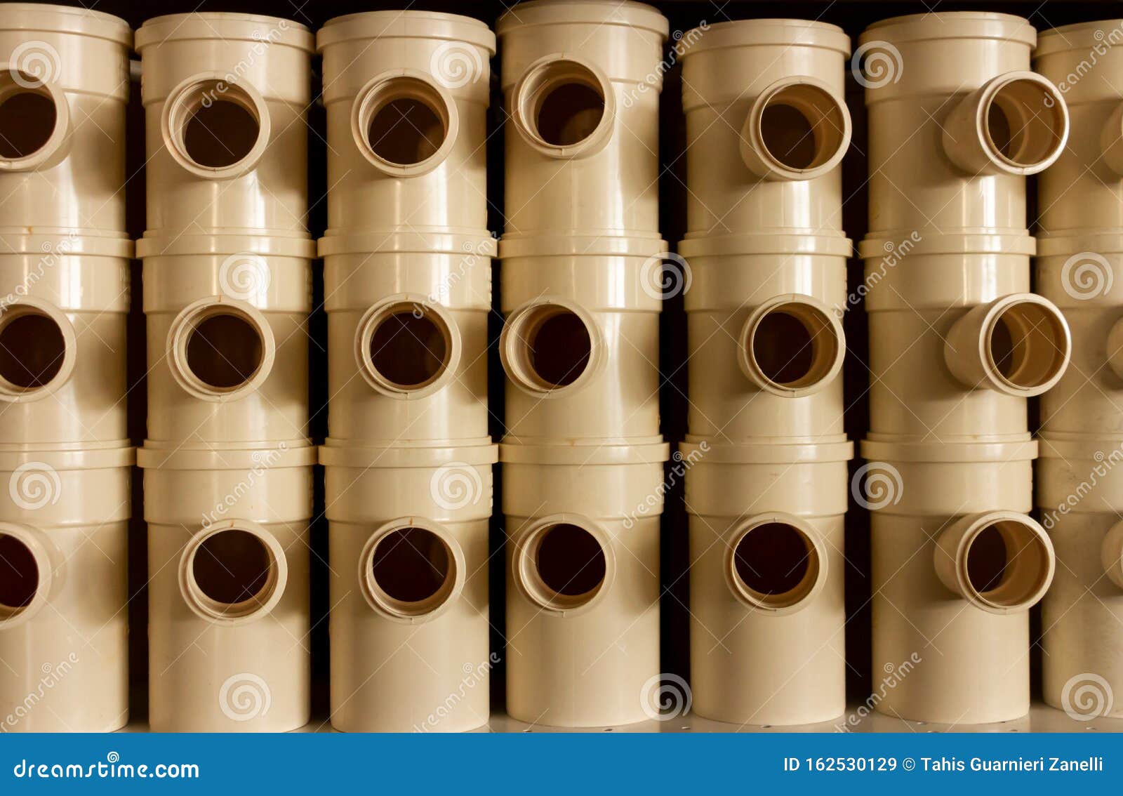 Sequence of Stacked White Plastic Pipes Stock Image - Image of building ...
