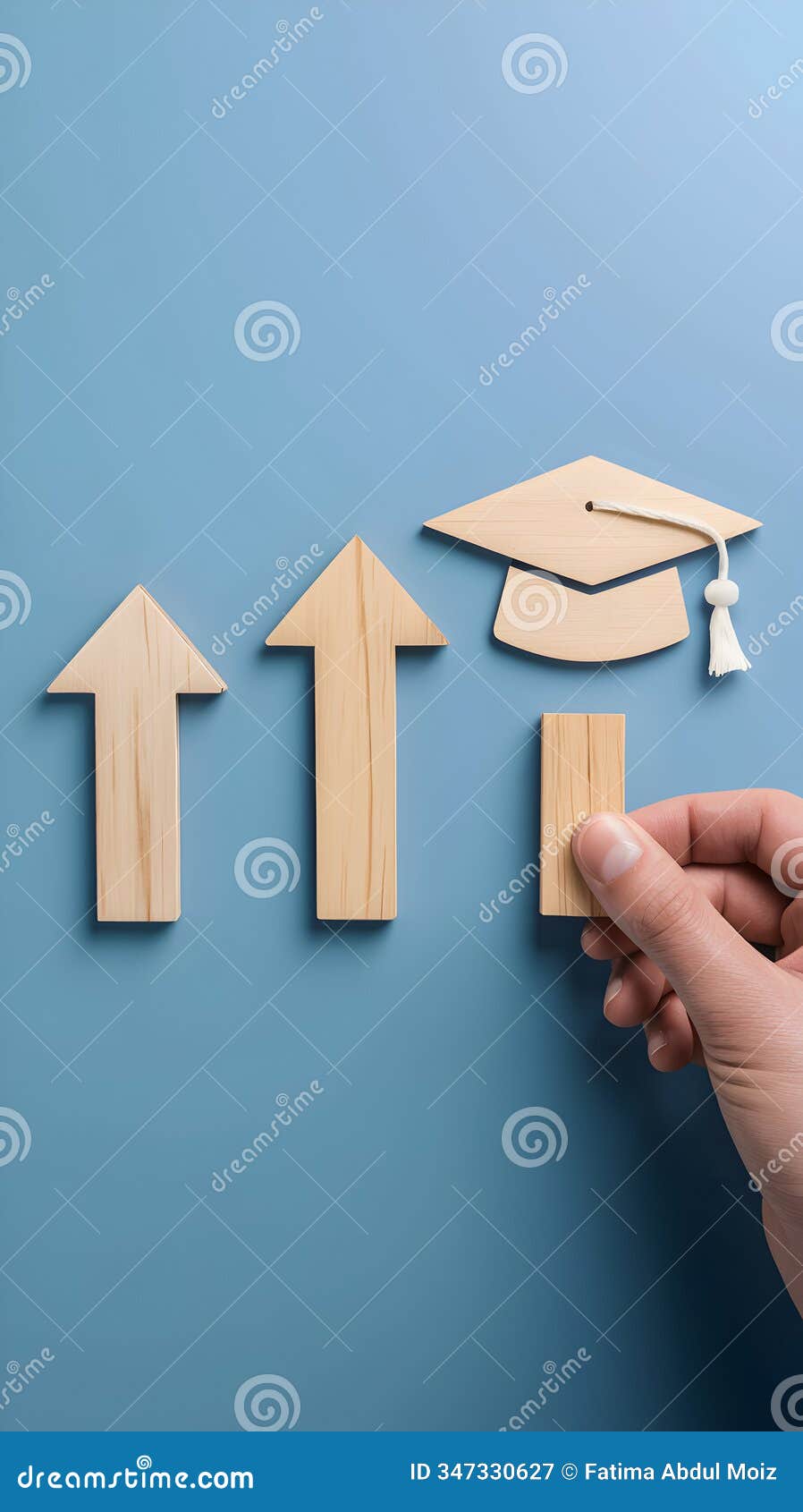 Sequence of Three Wooden Cutouts, Graduation Cap Held by Human Hand ...