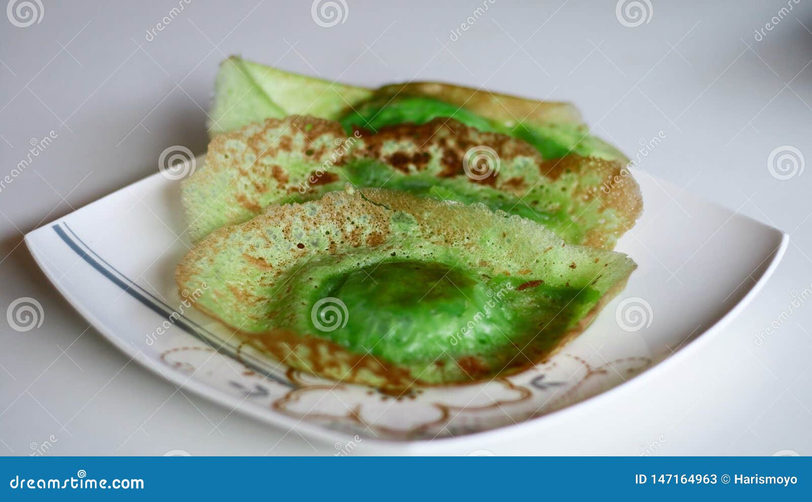 Green Serabi Or Surabi, Indonesian Traditional Food With Coconut Milk ...