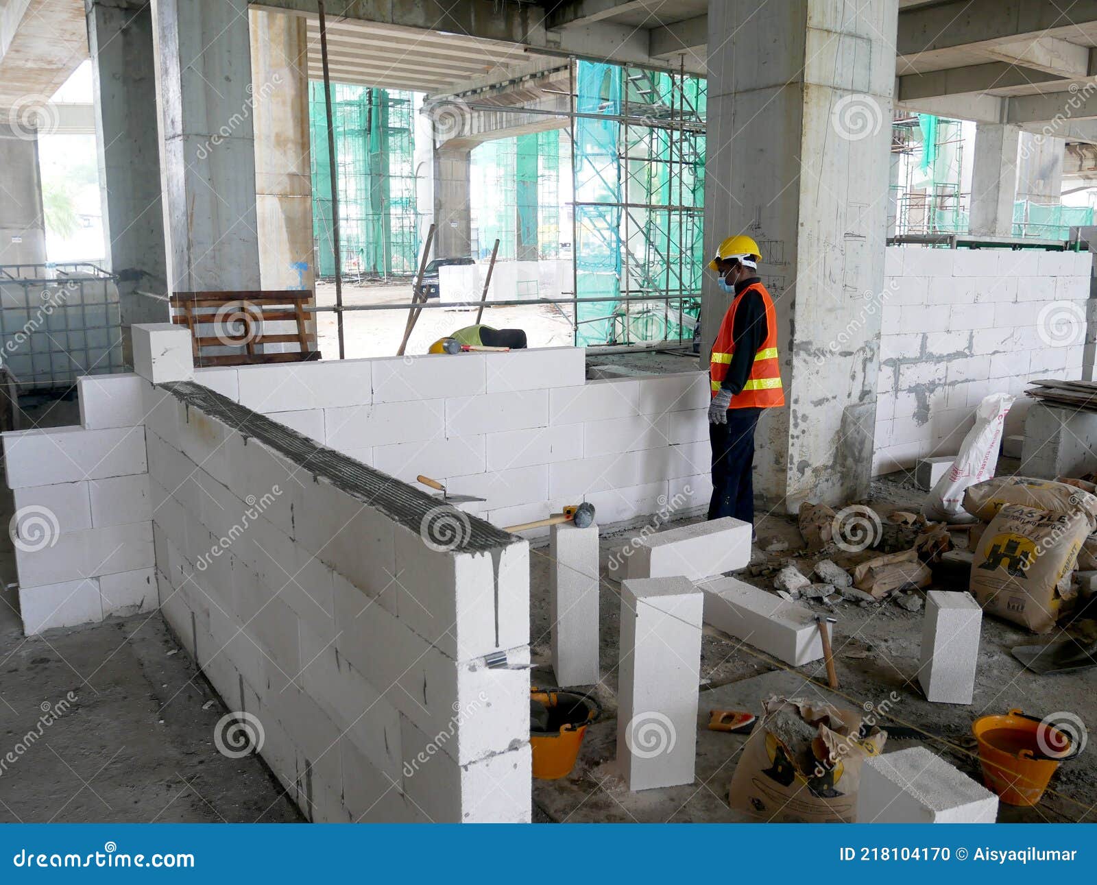 Blockwork by Construction Workers at the Construction Site. Editorial ...