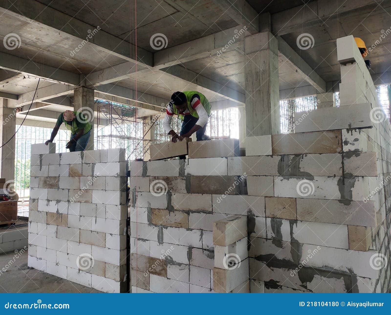 Blockwork by Construction Workers at the Construction Site. Editorial ...