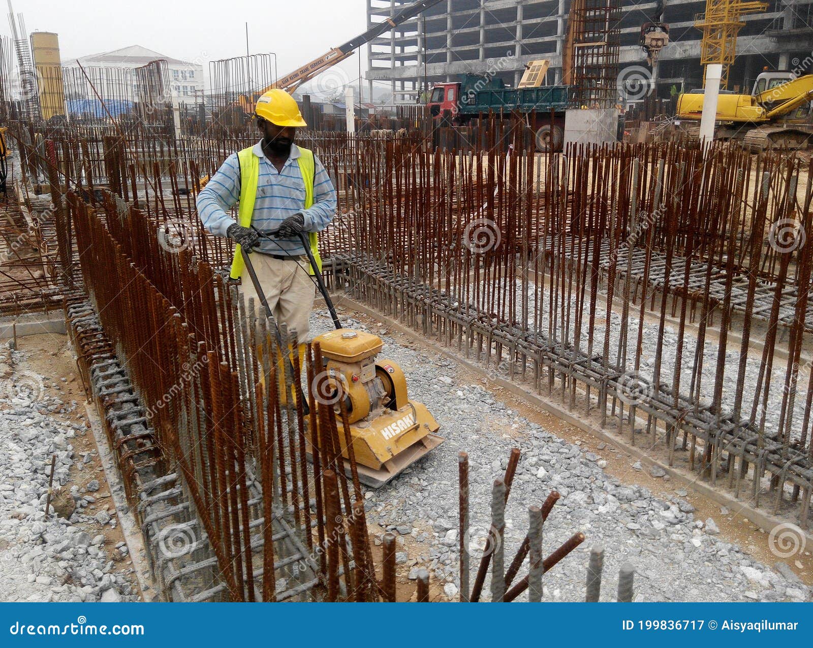 Construction Workers are Using the Baby Compactor To Level and Compact ...