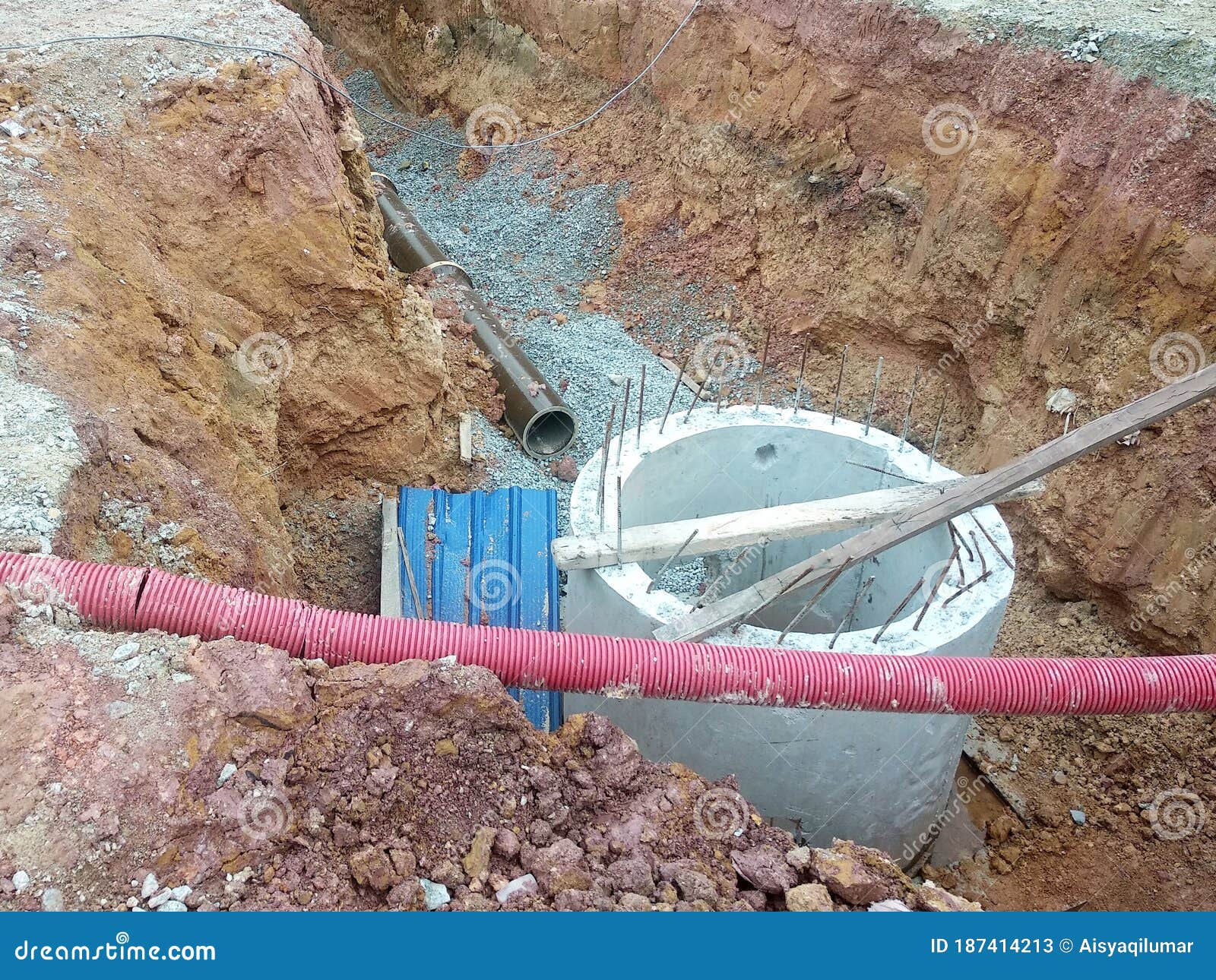 Utility Services Manhole Under Construction at the Construction Site ...