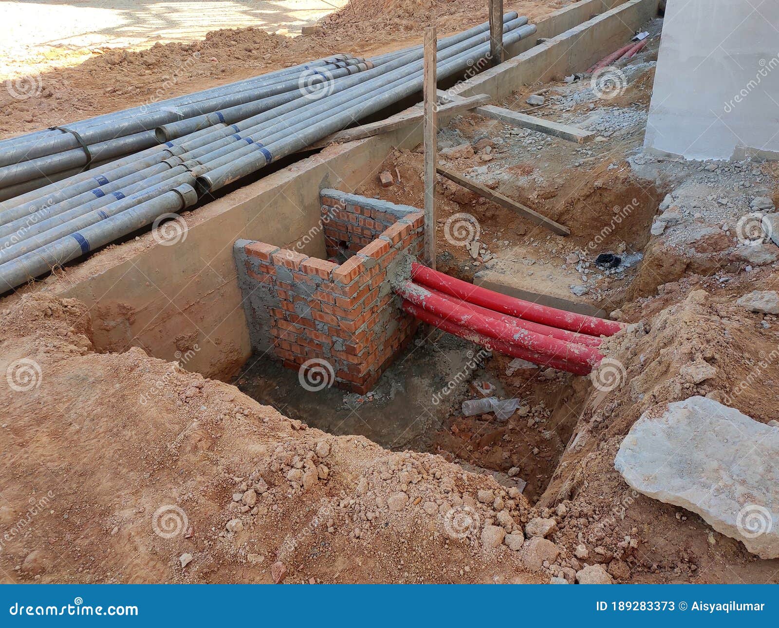 Utility Services Manhole Under Construction at the Construction Site ...