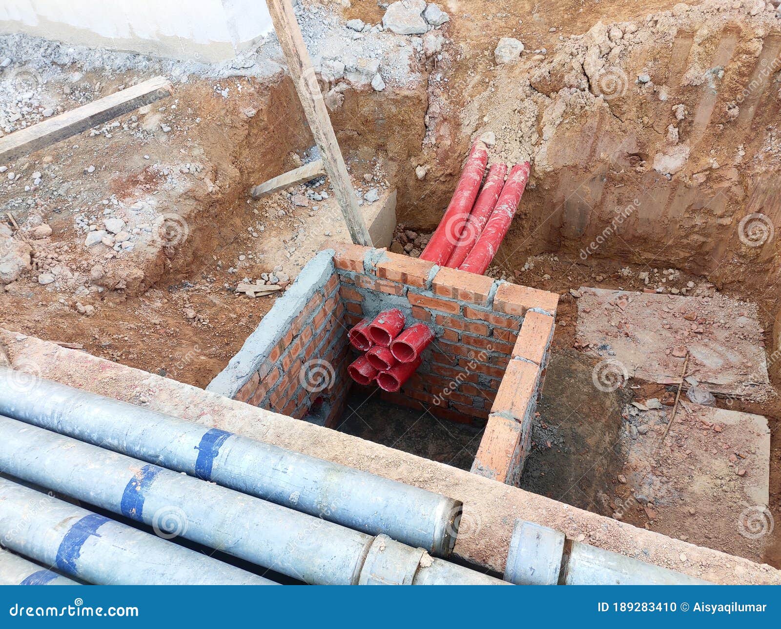 Utility Services Manhole Under Construction at the Construction Site ...