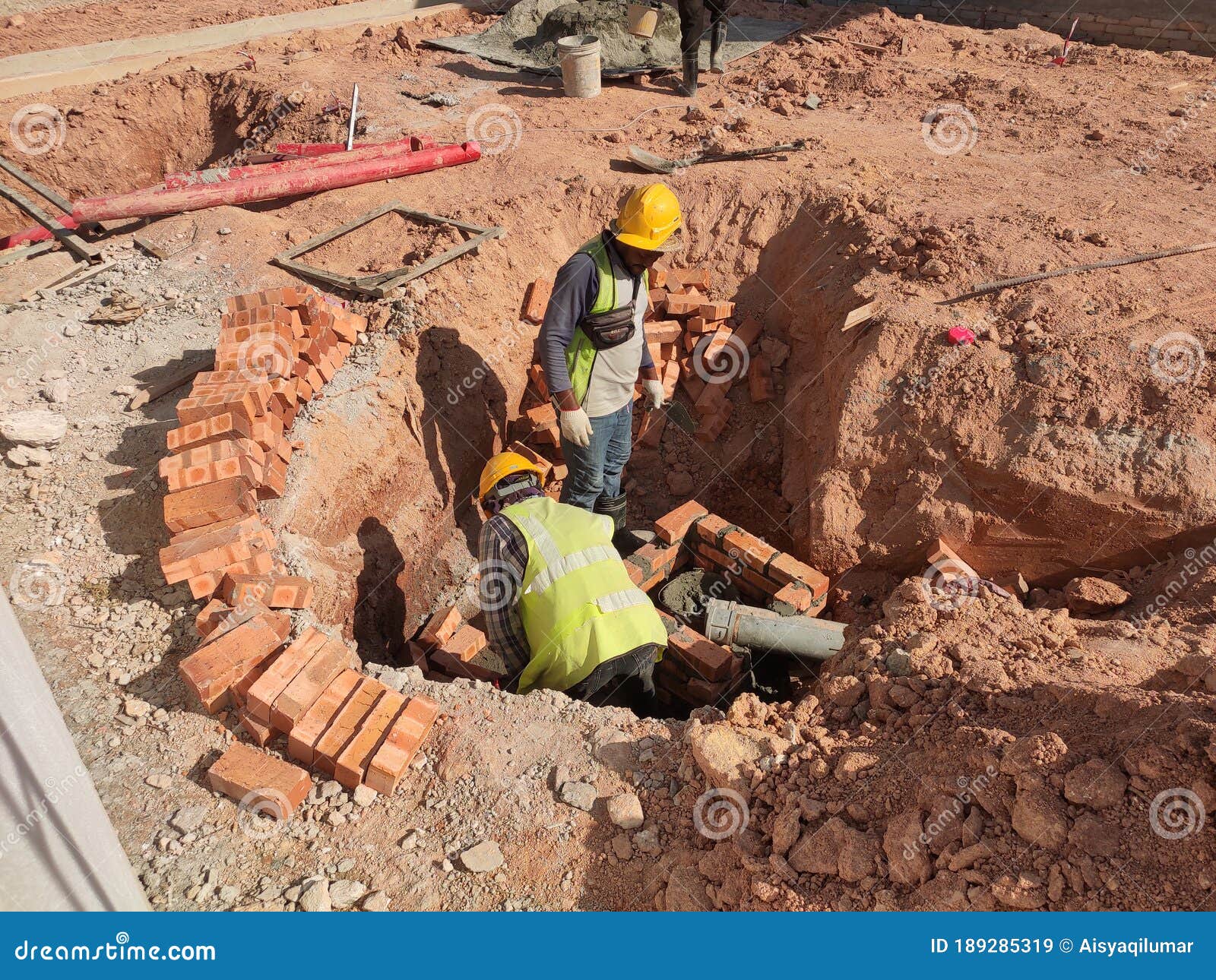 Utility Services Manhole Under Construction at the Construction Site ...