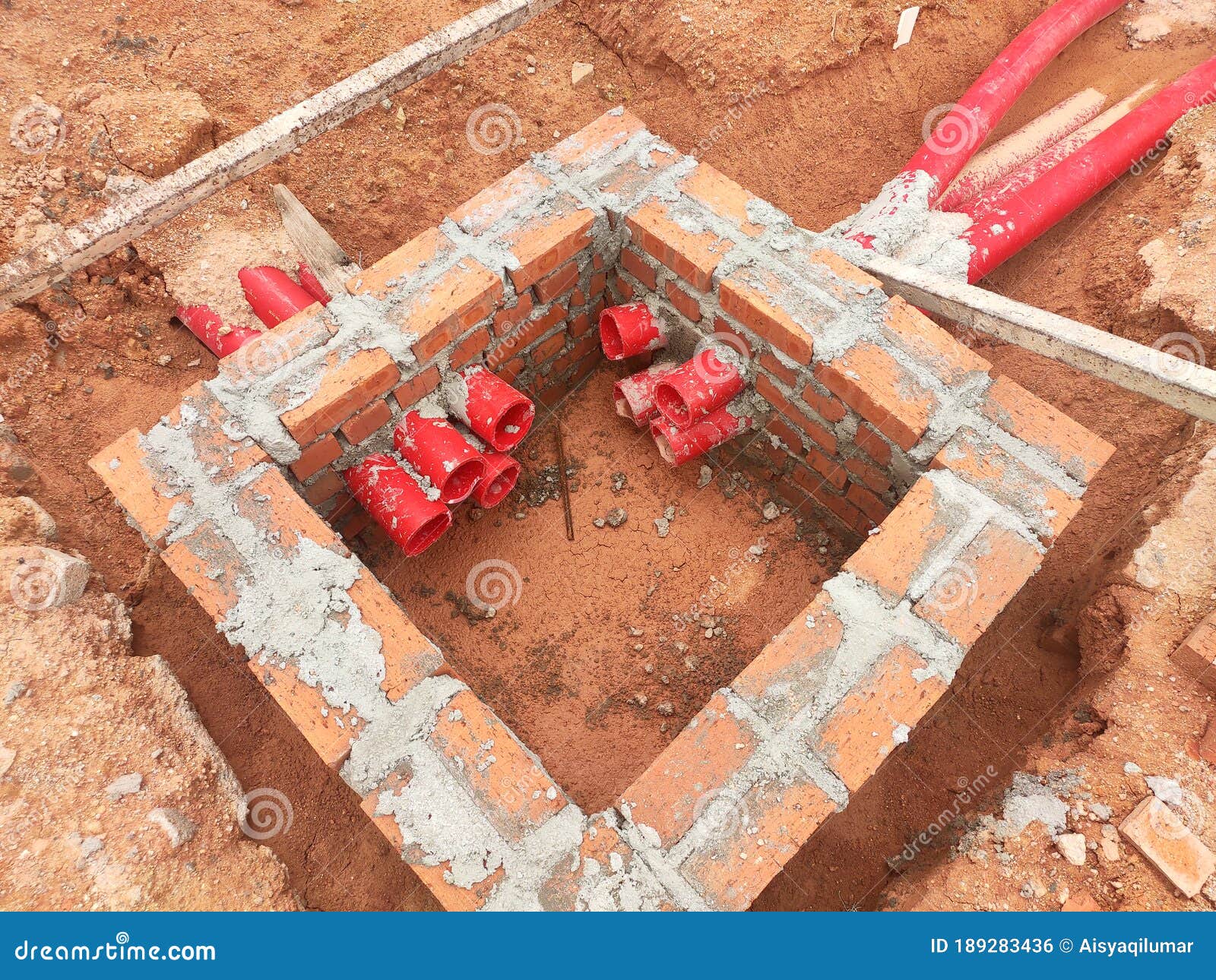 Utility Services Manhole Under Construction at the Construction Site ...