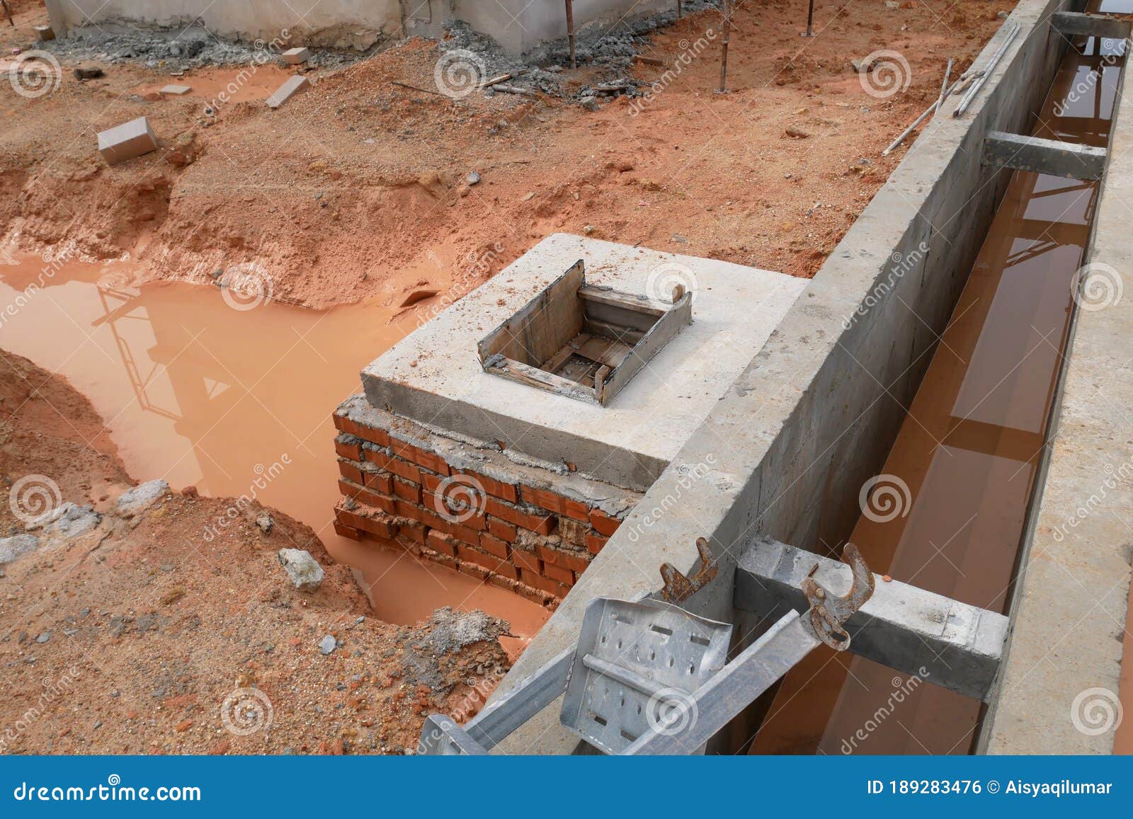 Utility Services Manhole Under Construction at the Construction Site ...