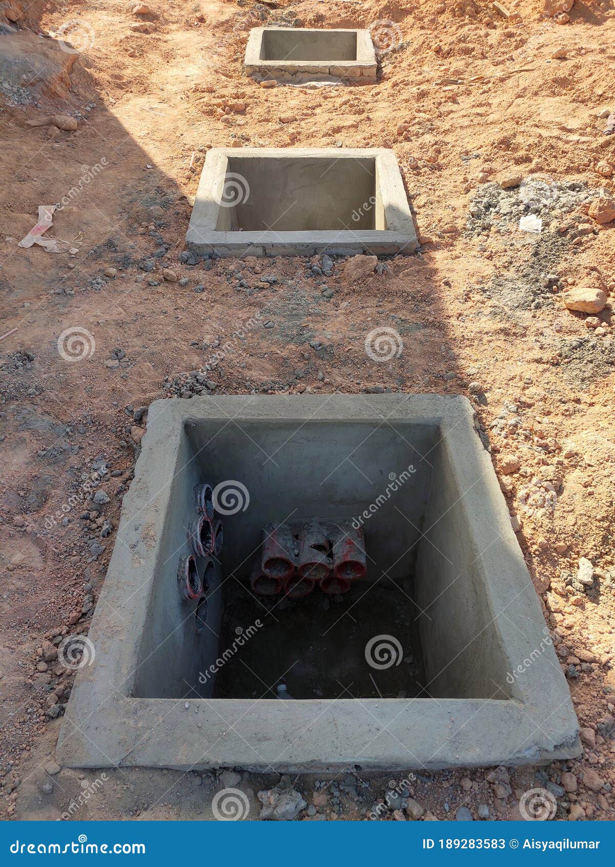 Utility Services Manhole Under Construction at the Construction Site ...
