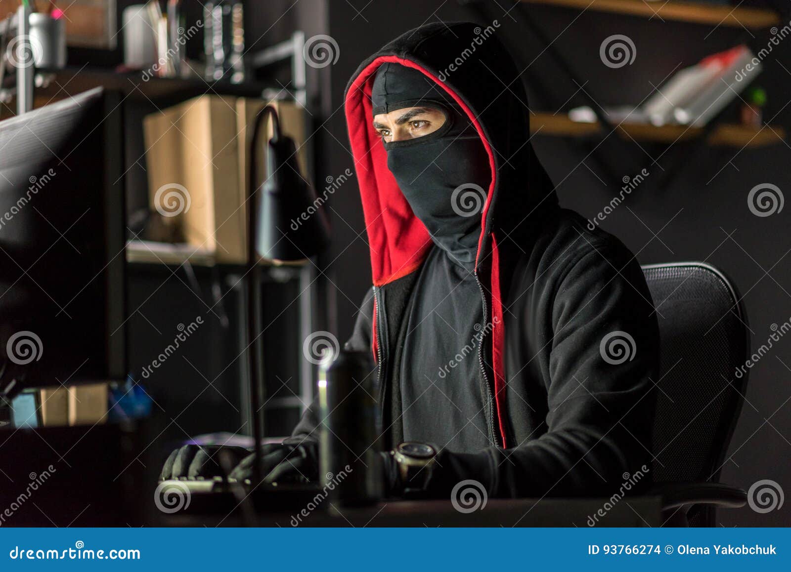Serene Computer Burglar Downloading Data at Desk Stock Photo - Image of ...