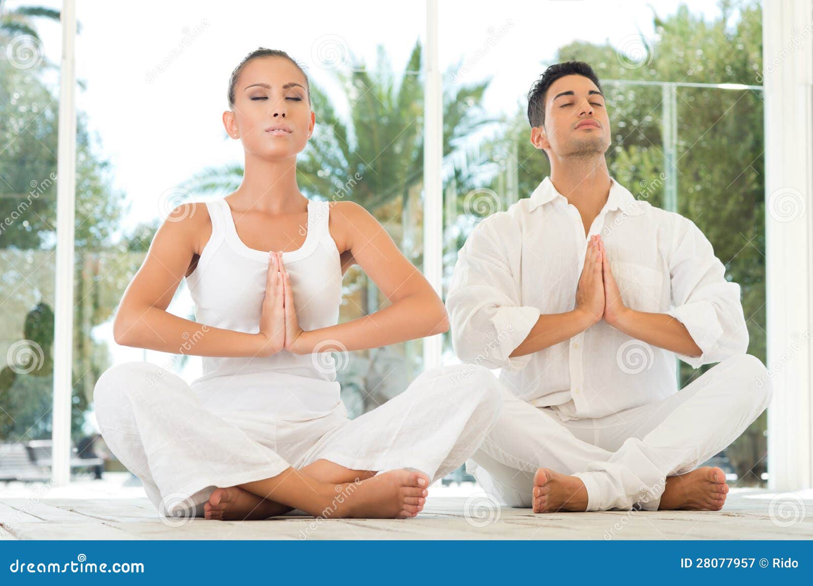 Serene Couple Doing Yoga stock image. Image of healthy - 28077957