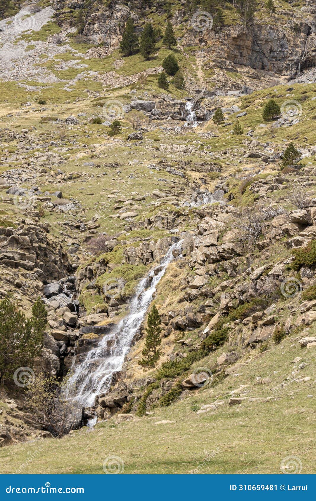 A Serene Mountain Landscape with a Cascading Waterfall Flowing Down ...
