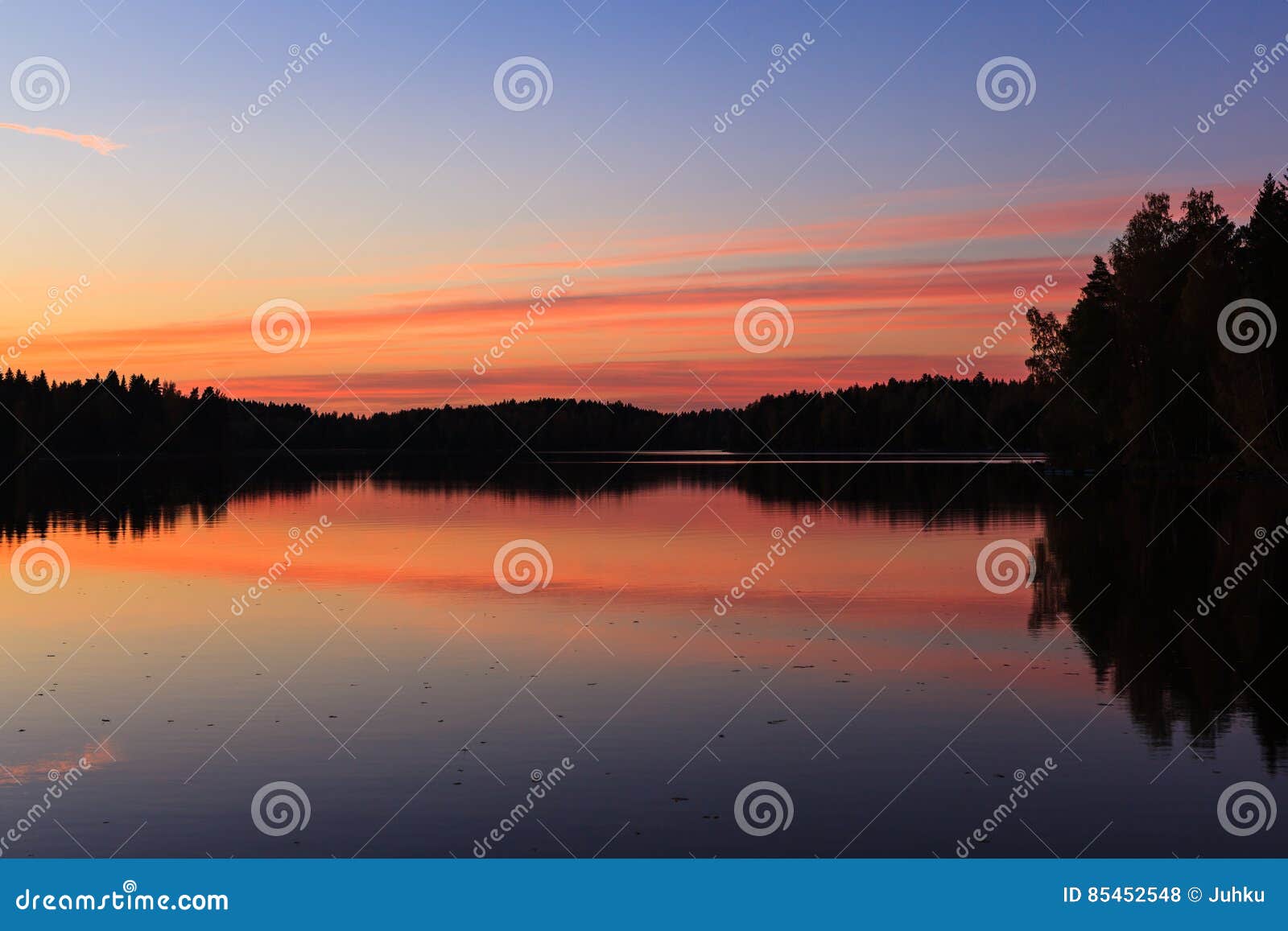 Serene View of Calm Lake and Sunset Clouds Stock Photo - Image of pond ...