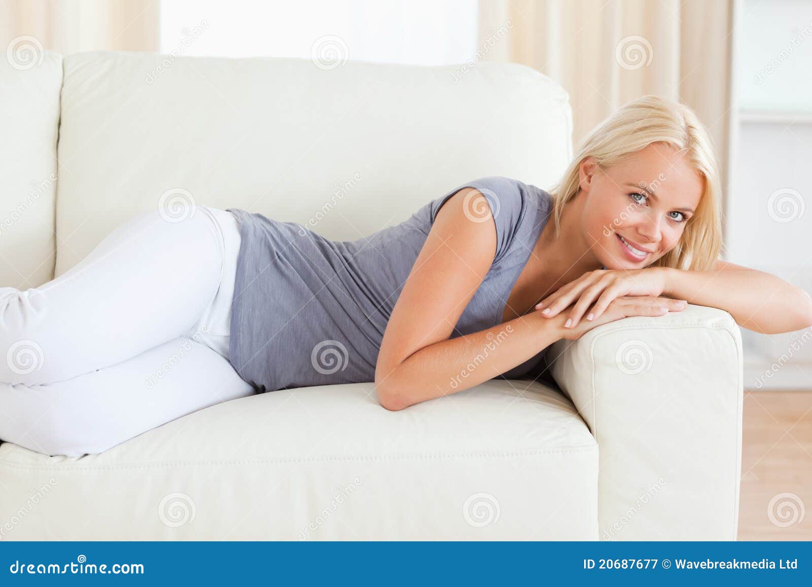 Serene Woman Resting on a Sofa Stock Image - Image of fresh, fashion ...