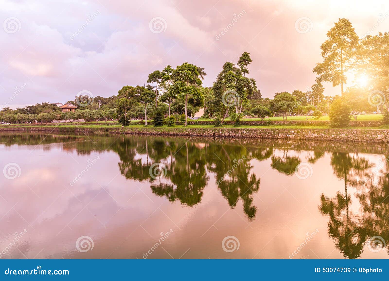 The Serenity of the Trees and the River, Under the Setting Sun Stock ...