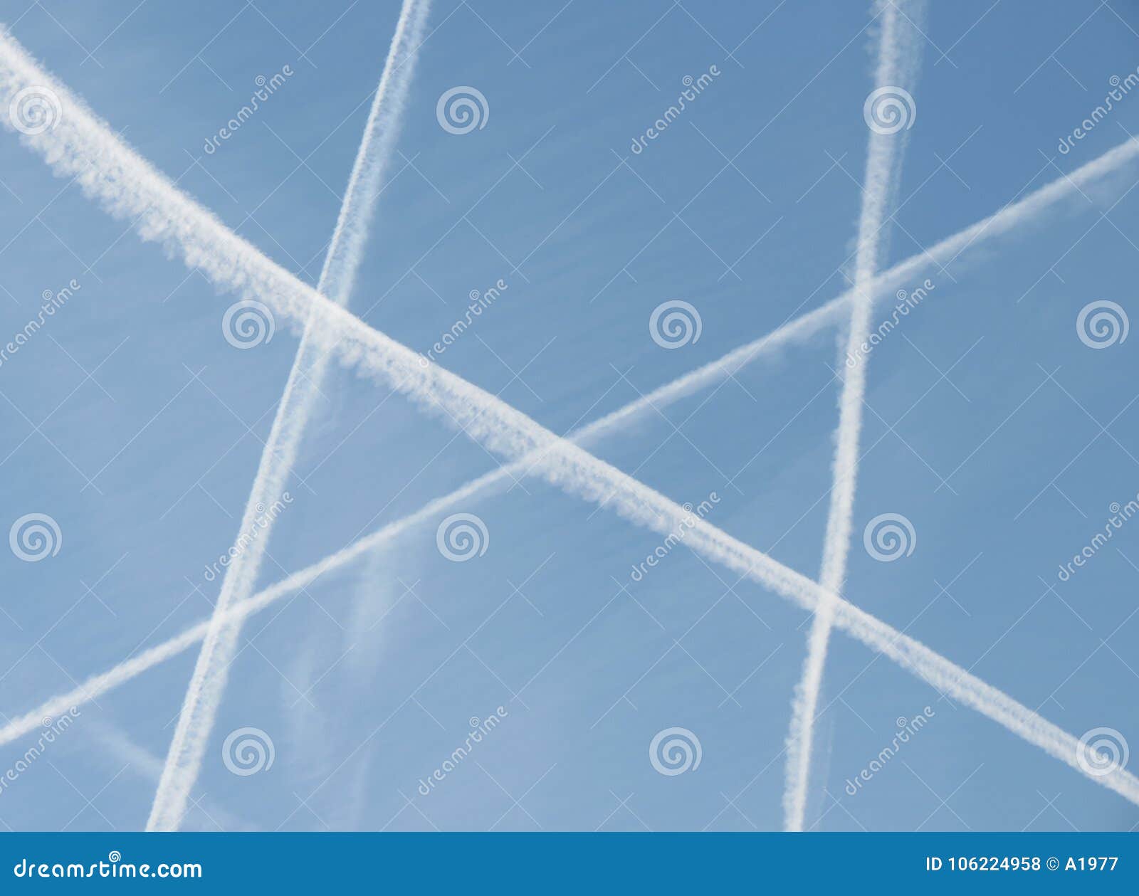Aircraft trails in the sky stock photo. Image of smoke - 106224958