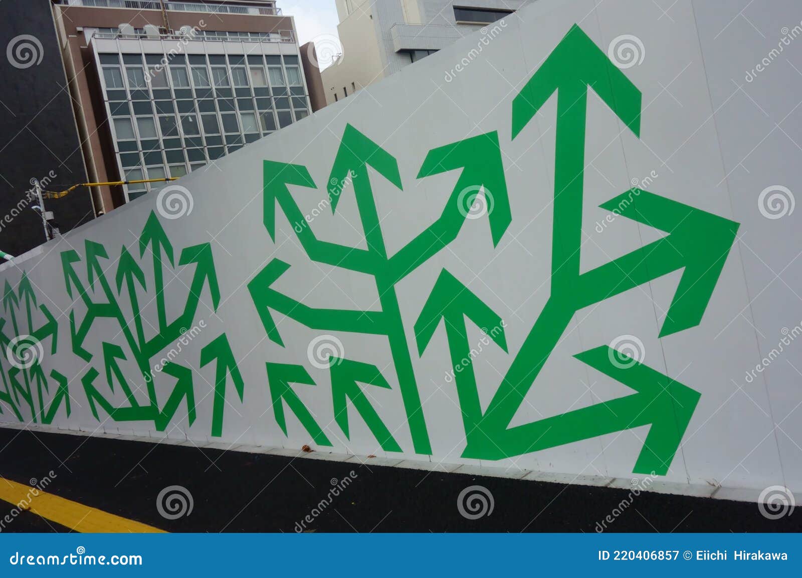 A Series of Green Arrows Illustrated on the Fence at the Construction ... A Series of Green Arrows Illustrated on the Fence at the Construction ...