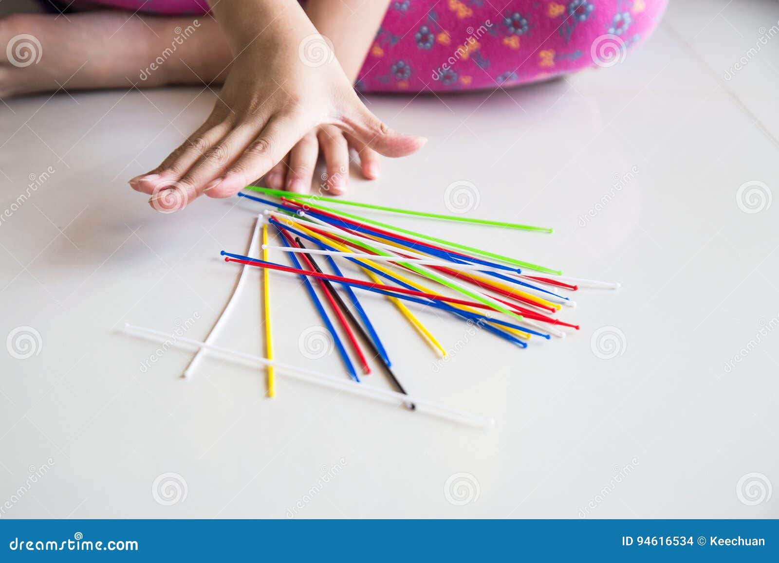 Series of Kid Playing Pick Up Sticks Fun Game Stock Photo - Image of ...