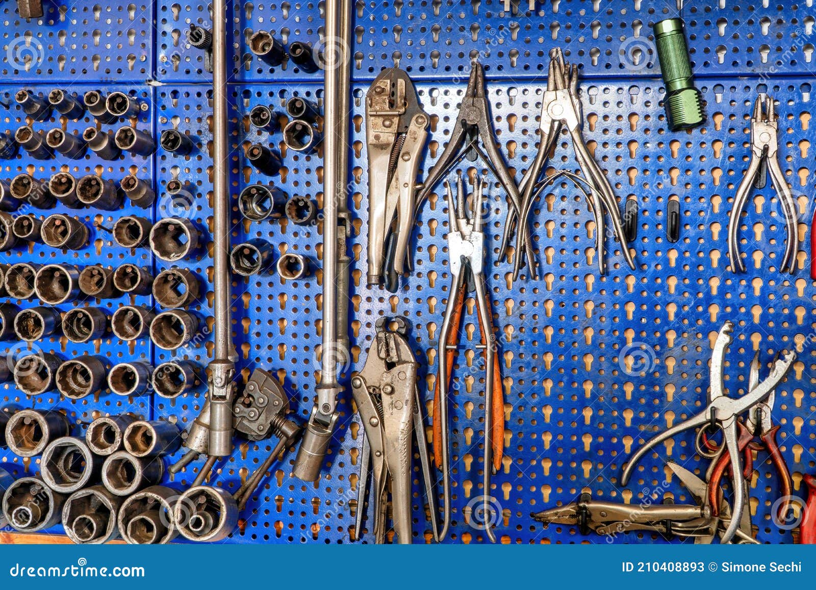 A SERIES of MECHANICAL TOOLS INCLUDING VARIOUS PLIERS, SOCKET WRENCHES ...