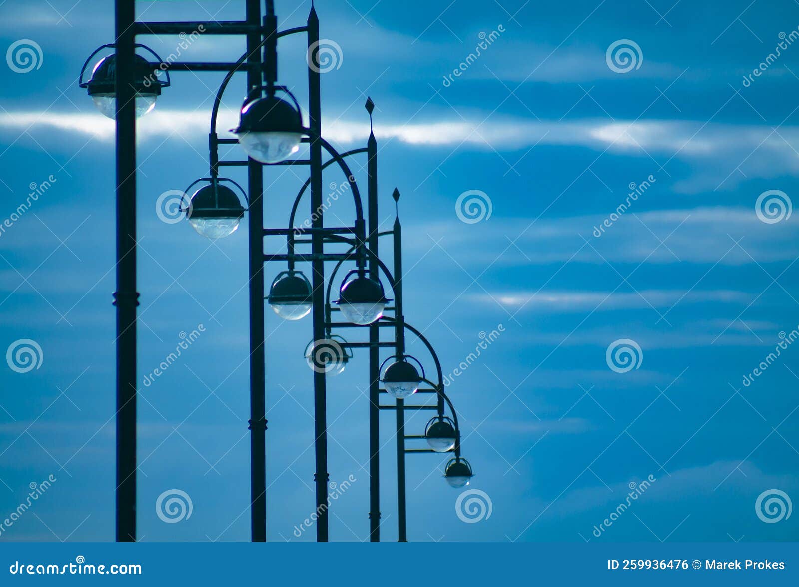 A Series of Public Lighting Lamps. Lampposts in a Row Stock Photo ...