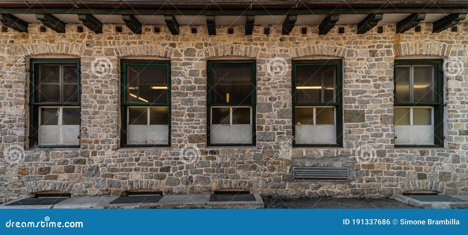 Series of Windows Lined Up on a Building of Clear Stones Stock Photo ...