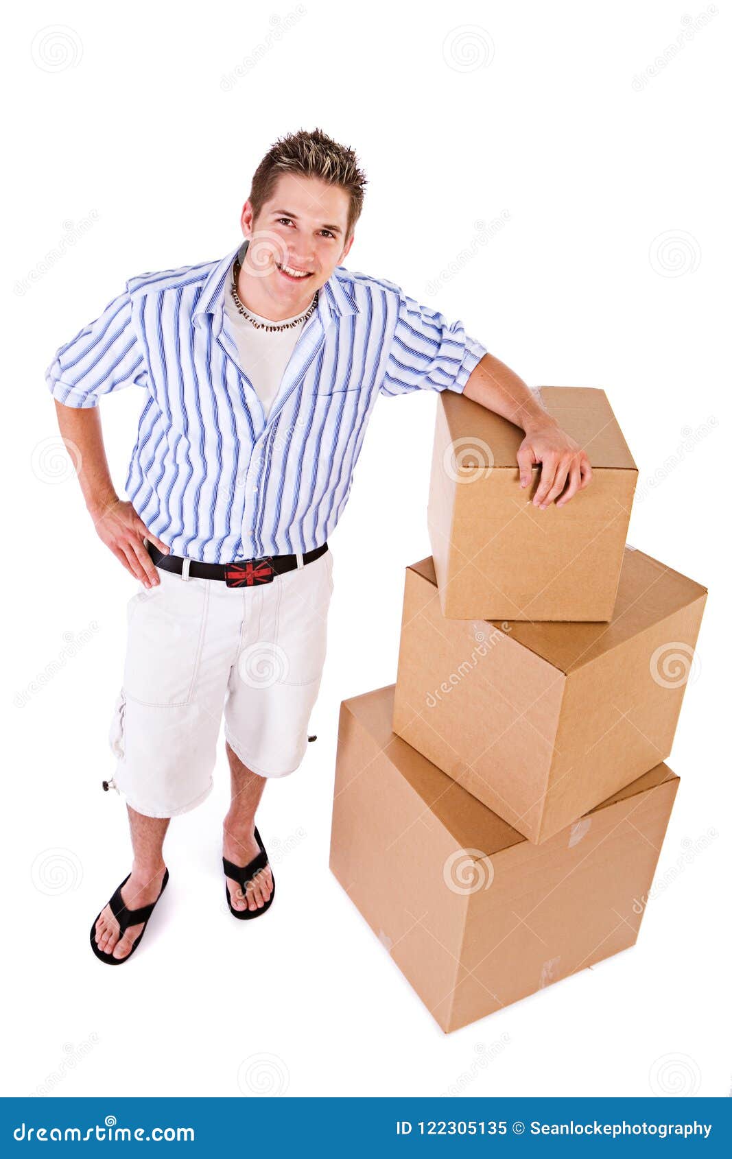 Student: Man Stands by Stack of Packing Boxes Stock Image - Image of ...