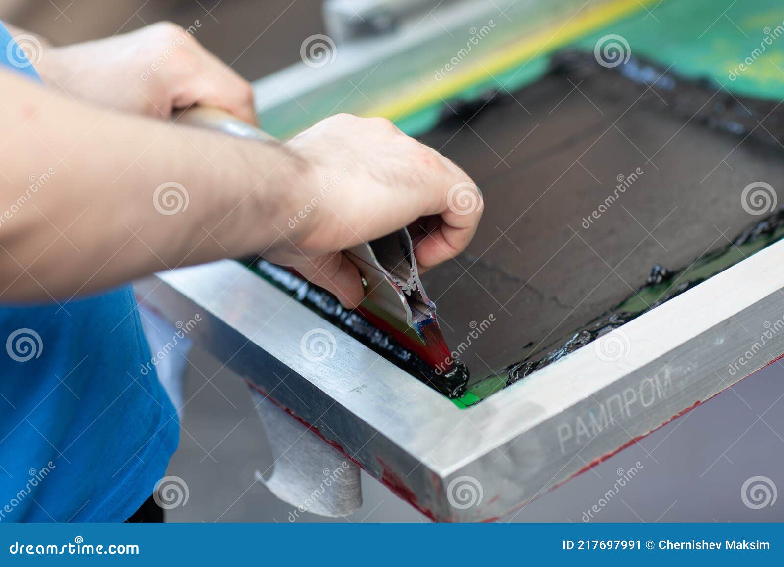 Serigraphy Silk Screen Print Process at Clothes Factory. Frame ...