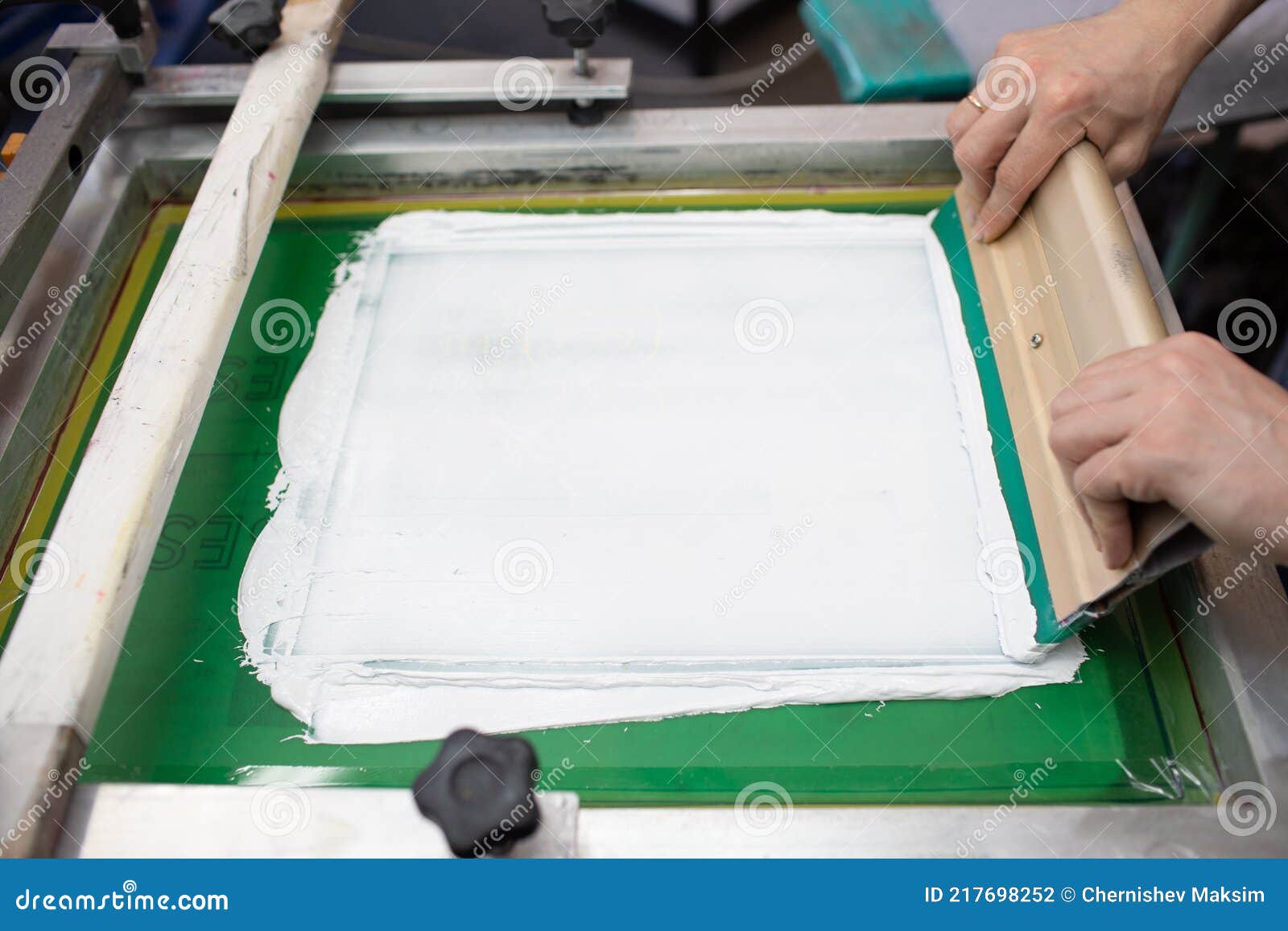Serigraphy Silk Screen Print Process At Clothes Factory. Frame ...