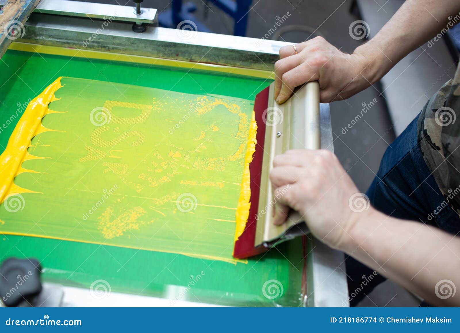 Serigraphy Silk Screen Print Process at Clothes Factory. Frame ...
