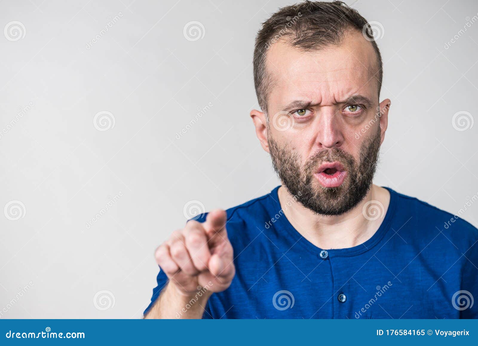 Serious And Grumpy Man Wake Up On The Bed On Blue Space Background ...