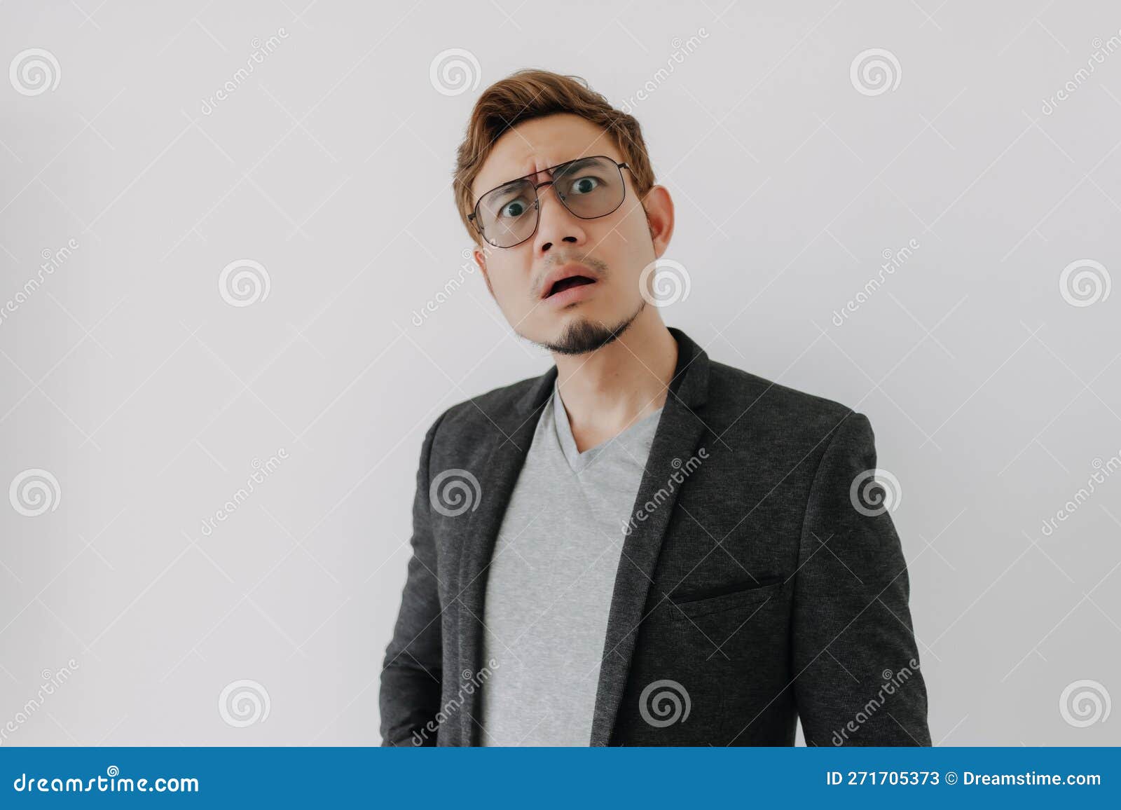 Serious and Aggressive Man in Black Suit Isolated on White. Stock Image ...