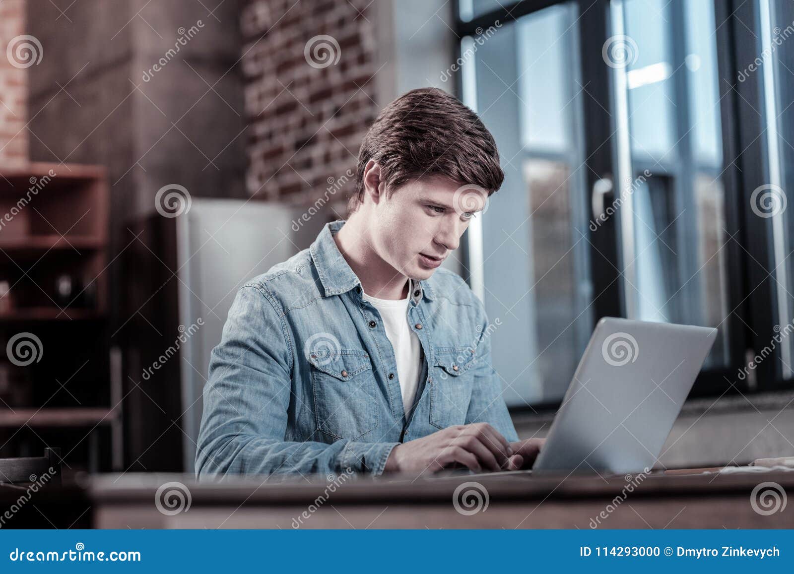 Serious Appealing Man Working on Laptop Stock Photo - Image of online ...