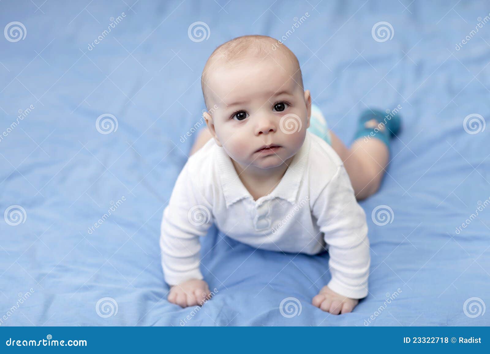 Serious baby boy stock photo. Image of lovable, cotton - 23322718