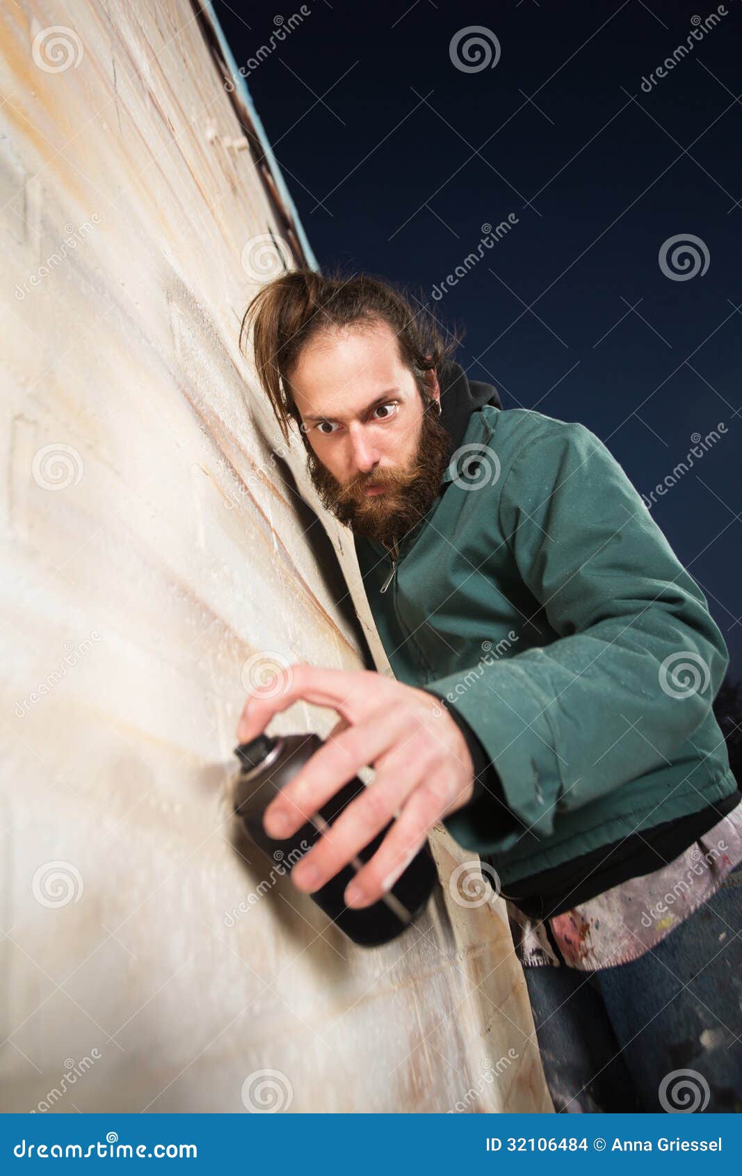 Serious Bearded Man Spray Painting Stock Photo - Image of wall ...